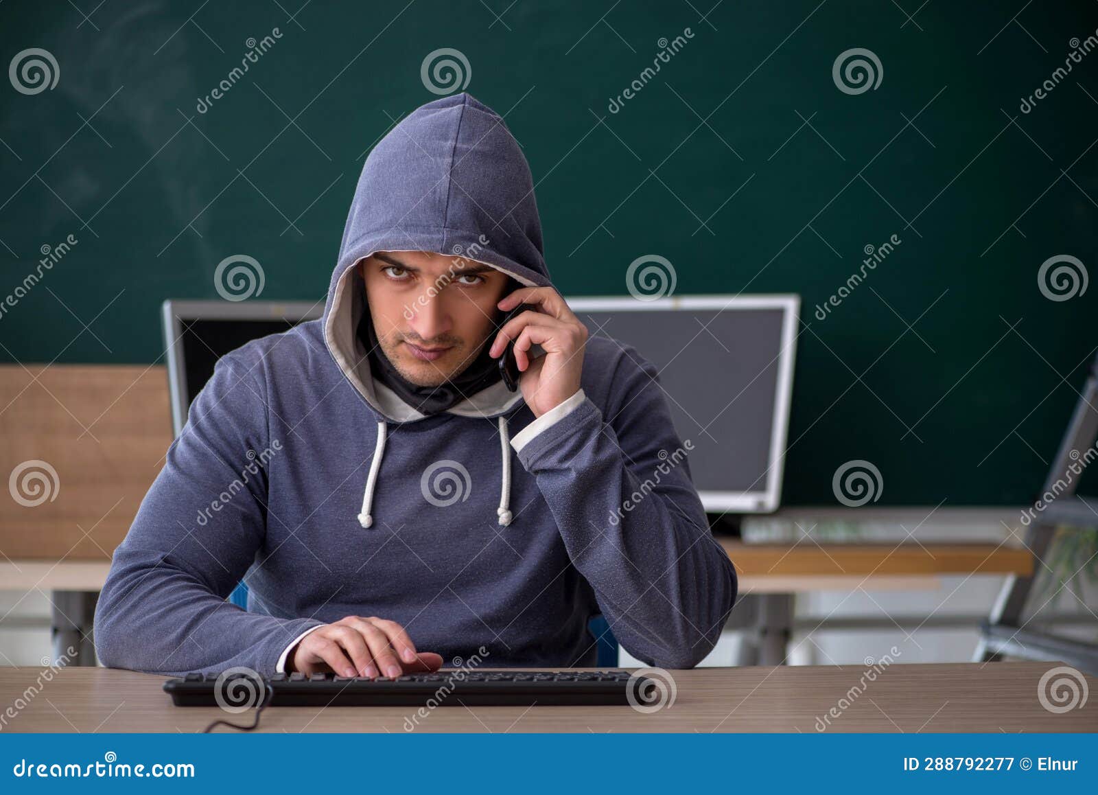 Young Male Hacker Sitting in the Classroom Stock Image - Image of ...