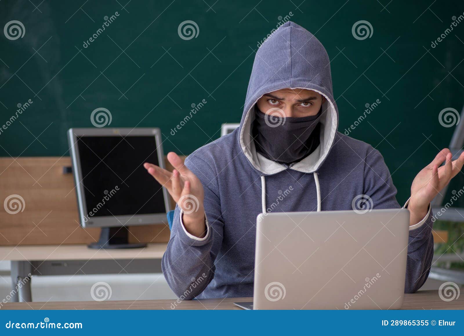 Young Male Hacker Sitting in the Classroom Stock Image - Image of ...
