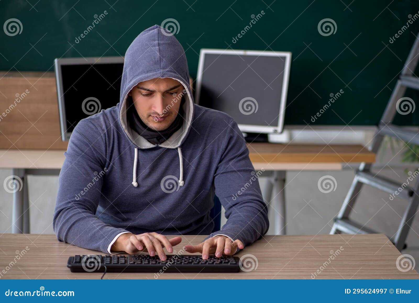 Young Male Hacker Sitting in the Classroom Stock Image - Image of ...