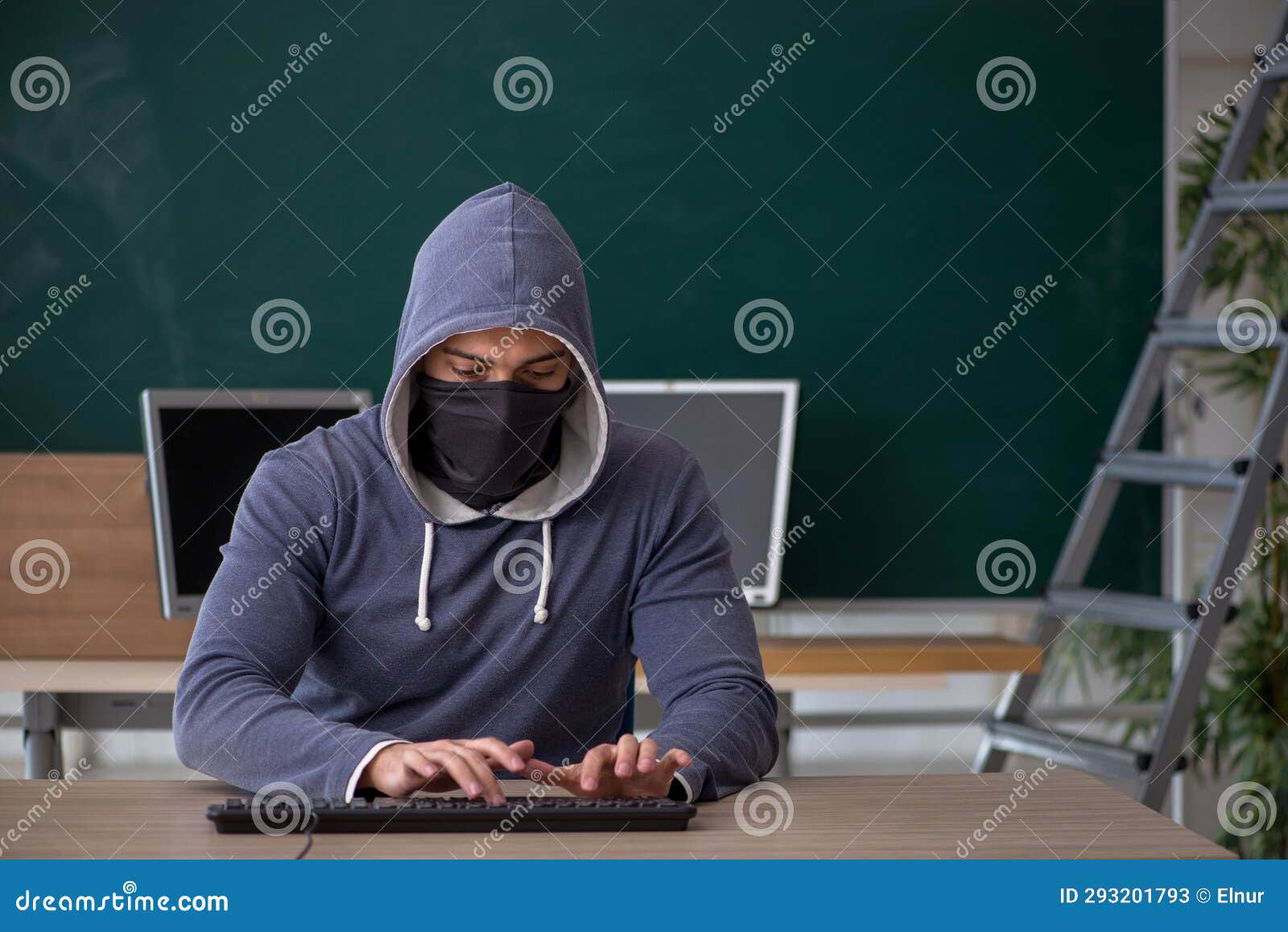 Young Male Hacker Sitting in the Classroom Stock Image - Image of ...
