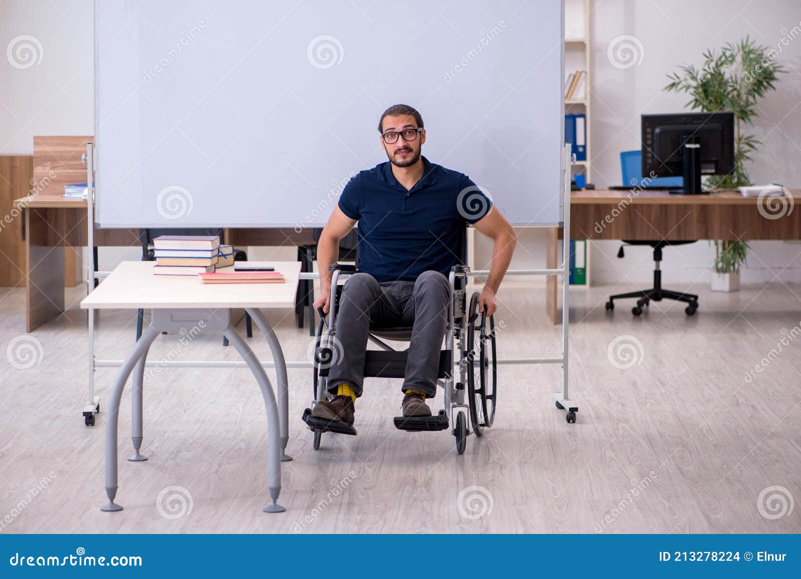 Young Male Handicapped Student in the Classroom Stock Photo - Image of ...
