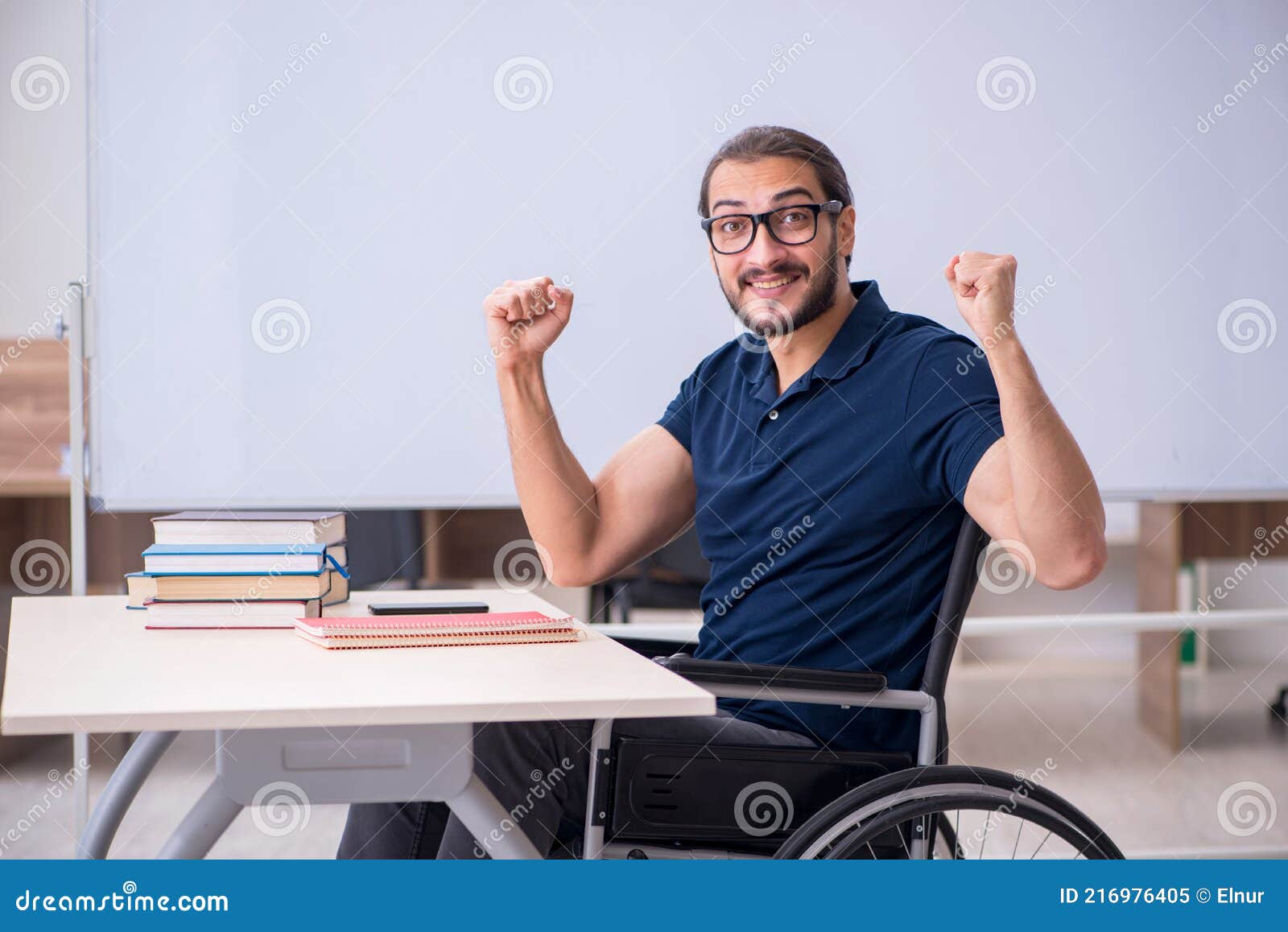 Young Male Handicapped Student in the Classroom Stock Image - Image of ...