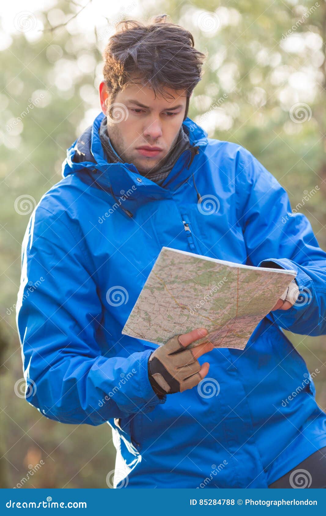 Hiker Reading A Map Royalty-Free Stock Image | CartoonDealer.com #76301956
