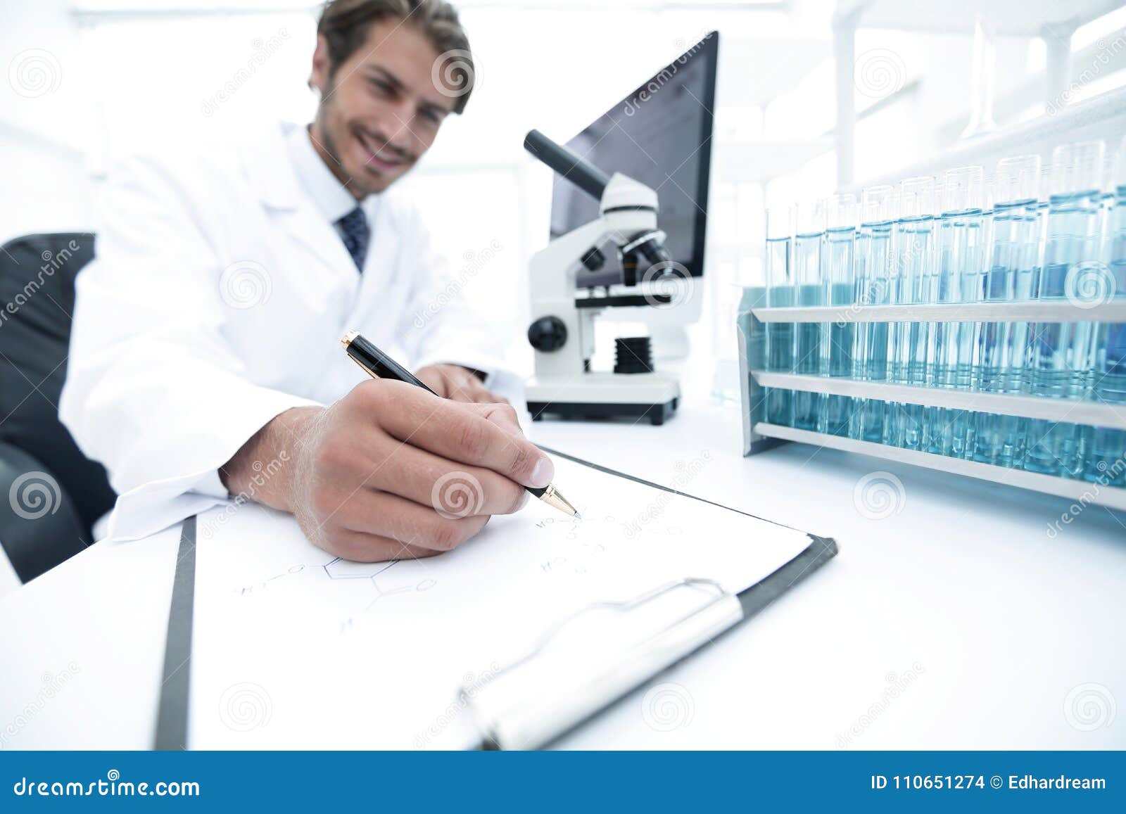 Scientist Makes a Note of Experiment in the Laboratory Stock Photo ...
