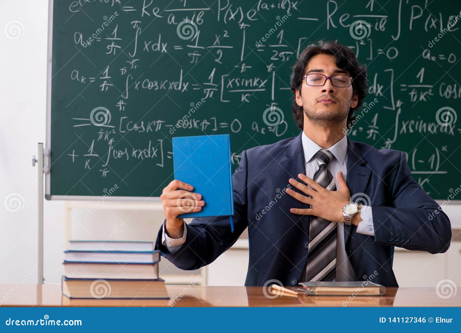 The Young Male Math Teacher in Classroom Stock Photo - Image of ...