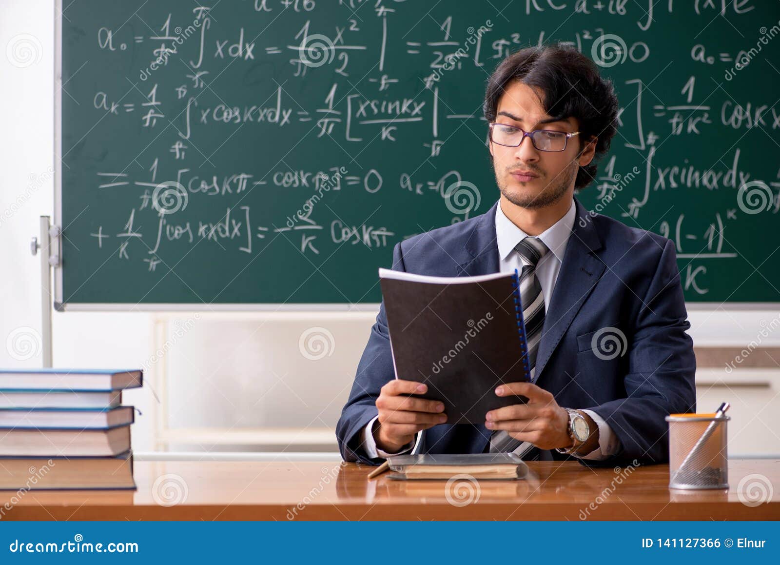 The Young Male Math Teacher in Classroom Stock Photo - Image of exam ...