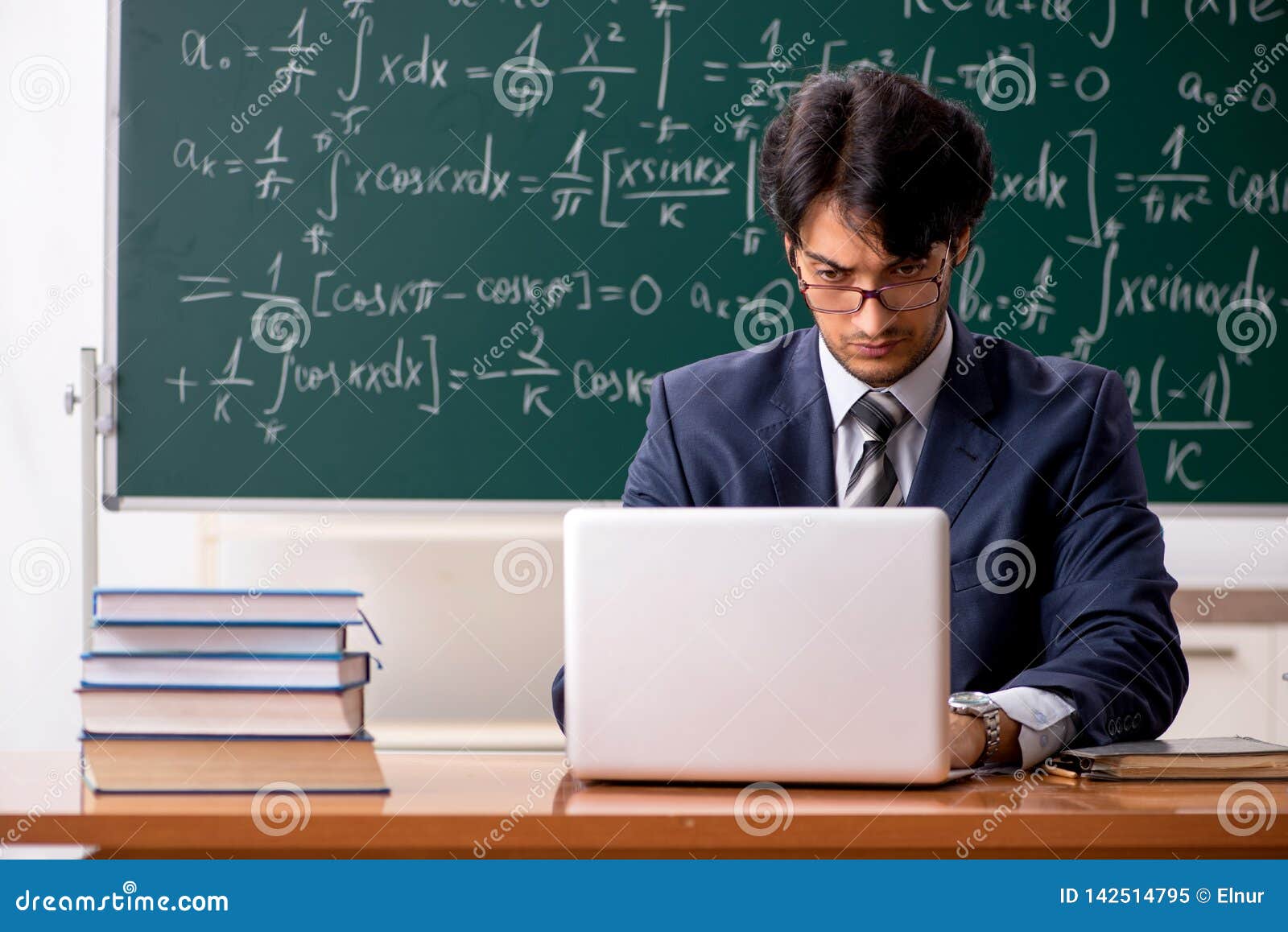The Young Male Math Teacher in Classroom Stock Image - Image of ...