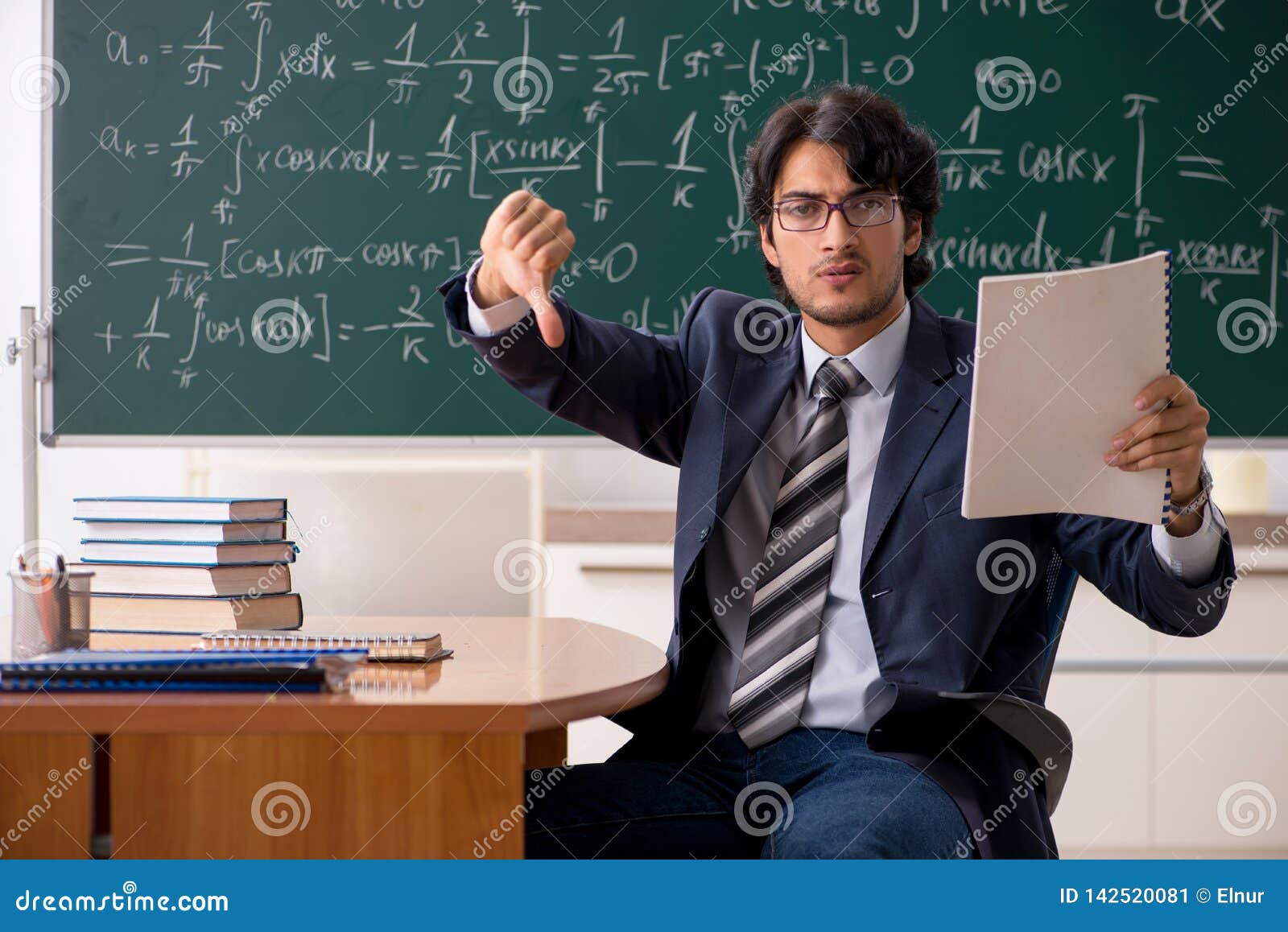 The Young Male Math Teacher in Classroom Stock Image - Image of ...