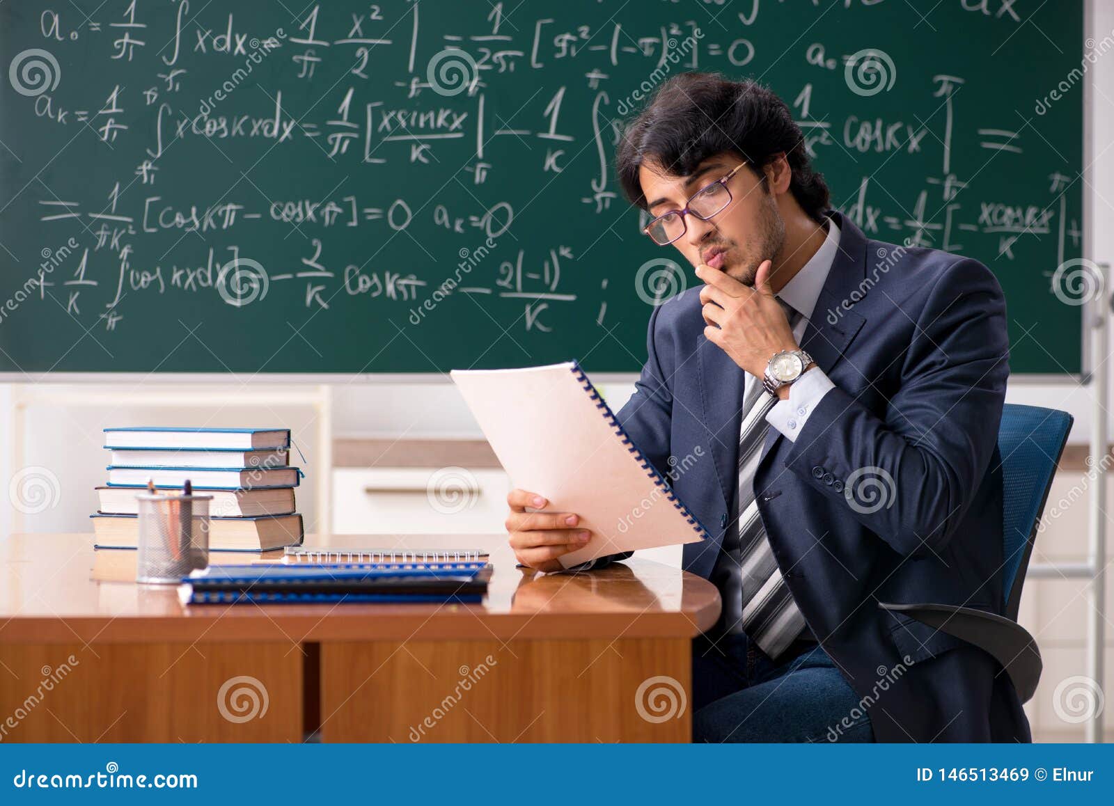 The Young Male Math Teacher in Classroom Stock Image - Image of ...