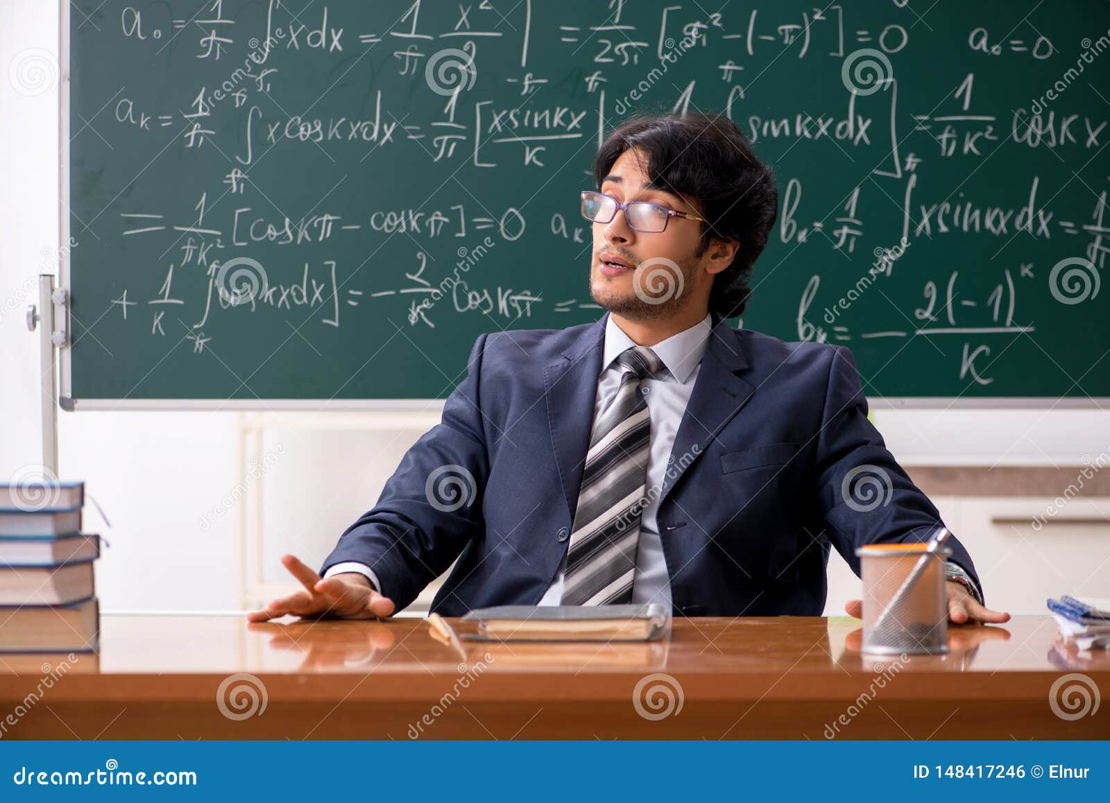 The Young Male Math Teacher in Classroom Stock Photo - Image of college ...