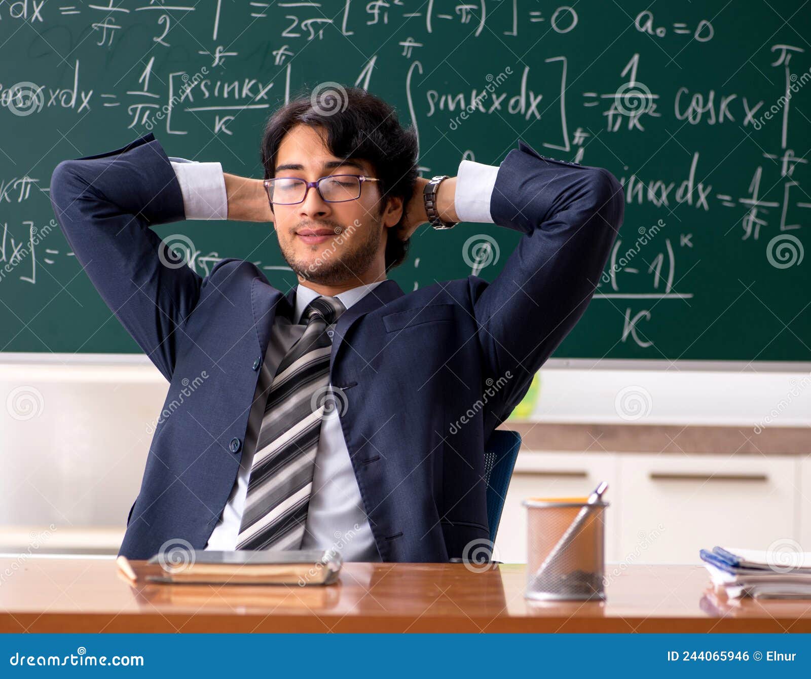 Young Male Math Teacher in Classroom Stock Photo - Image of ...