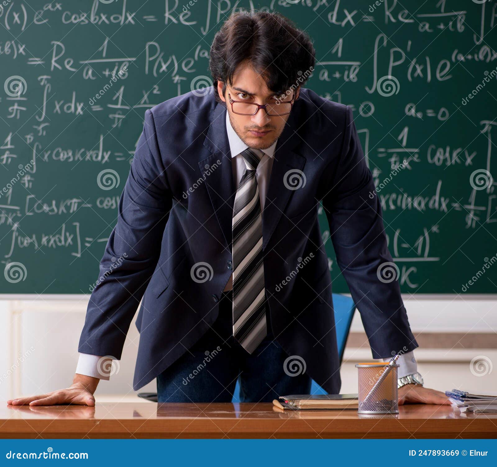 Young Male Math Teacher in Classroom Stock Image - Image of classroom ...