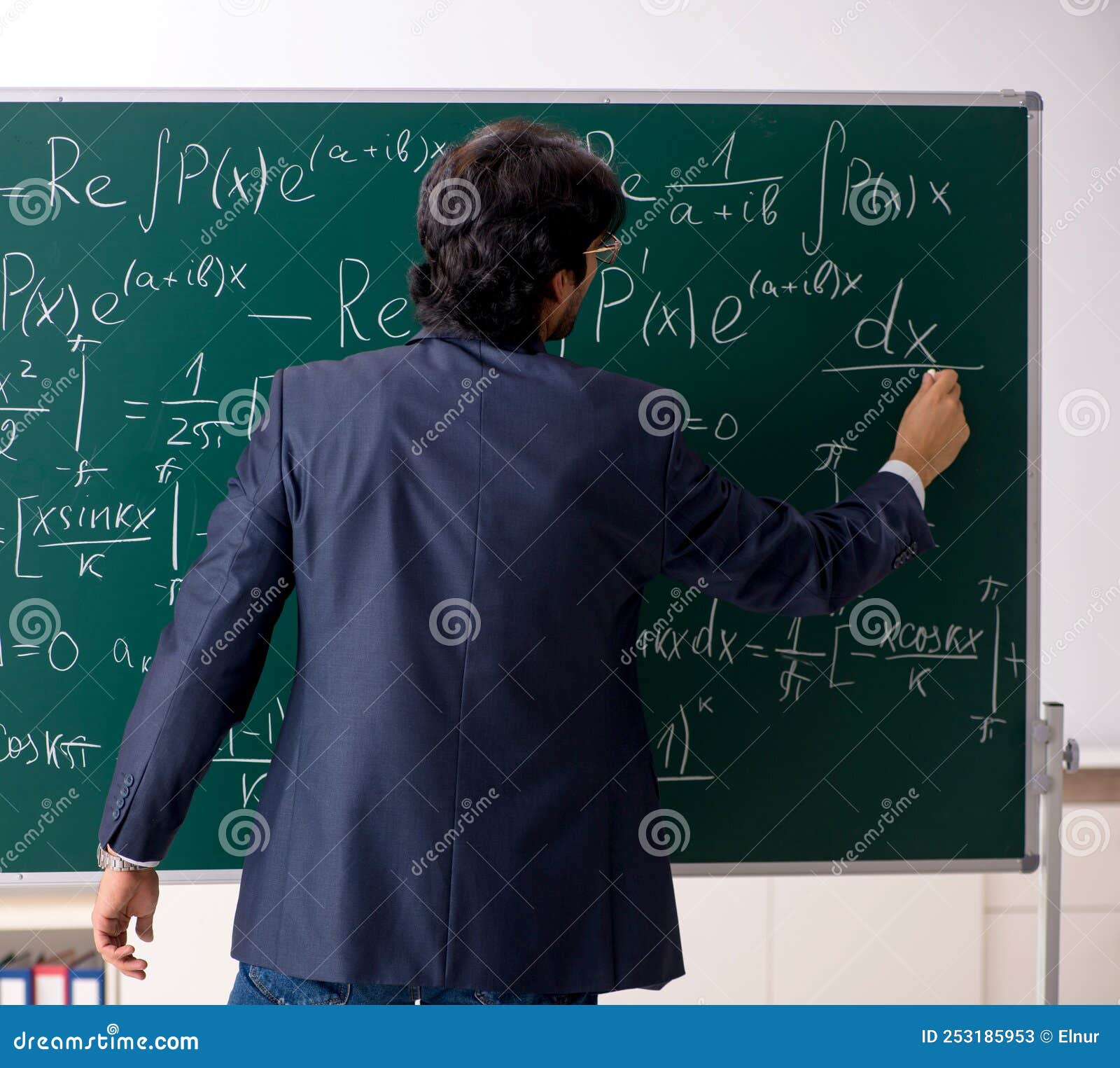 Young Male Math Teacher in Classroom Stock Image - Image of explaining ...