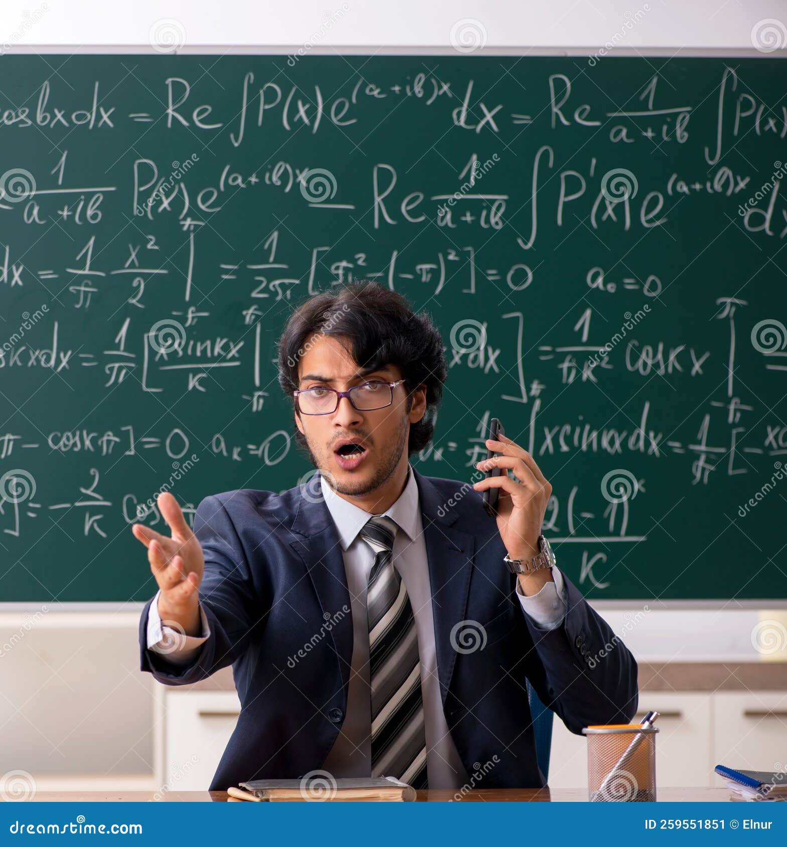 Young Male Math Teacher in Classroom Stock Image - Image of knowledge ...