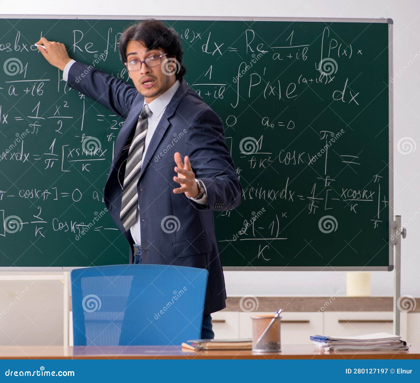 Young Male Math Teacher in Classroom Stock Image - Image of college ...