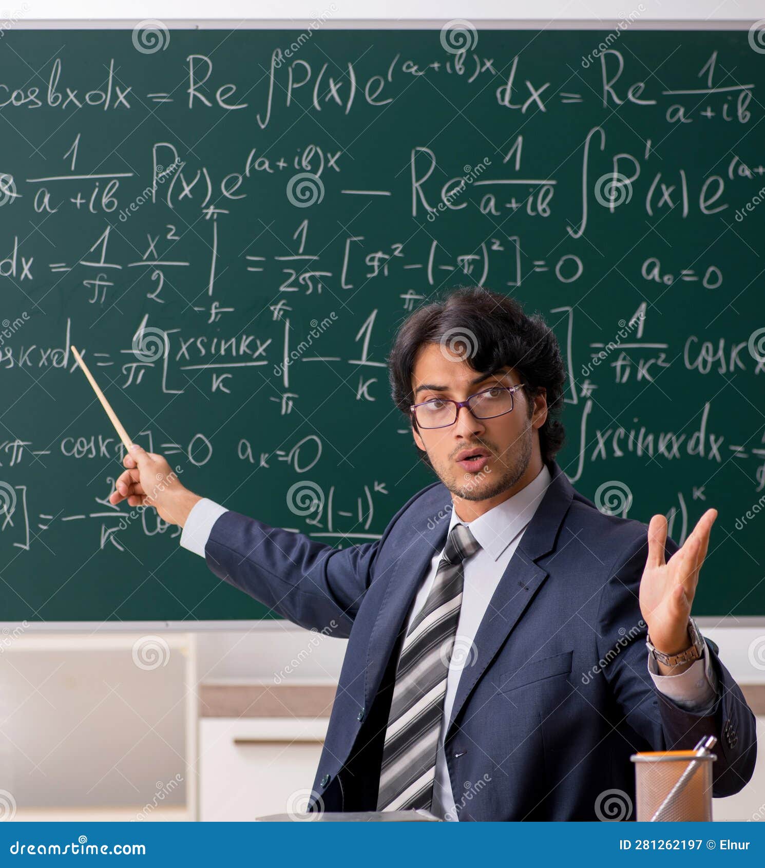Young Male Math Teacher in Classroom Stock Image - Image of classroom ...