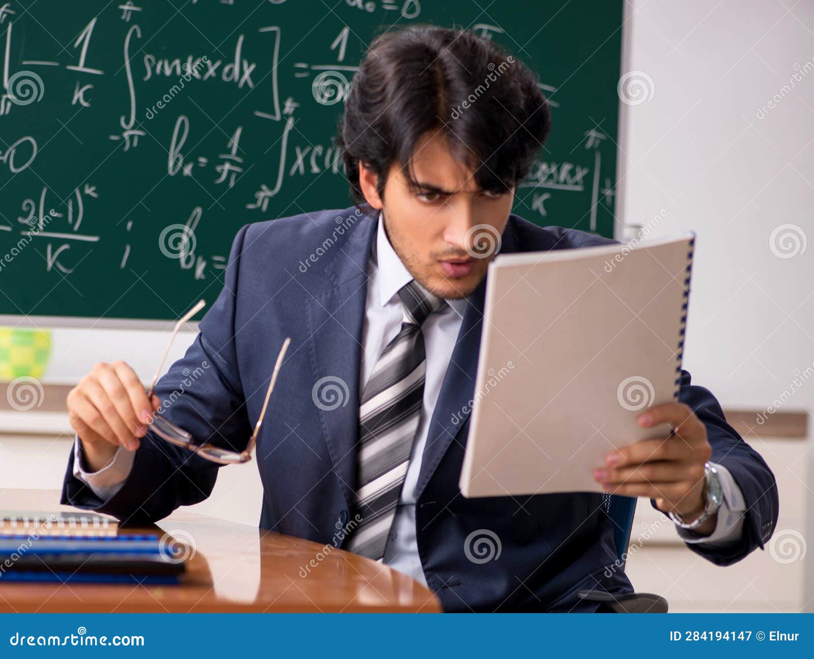 Young Male Math Teacher in Classroom Stock Image - Image of green ...