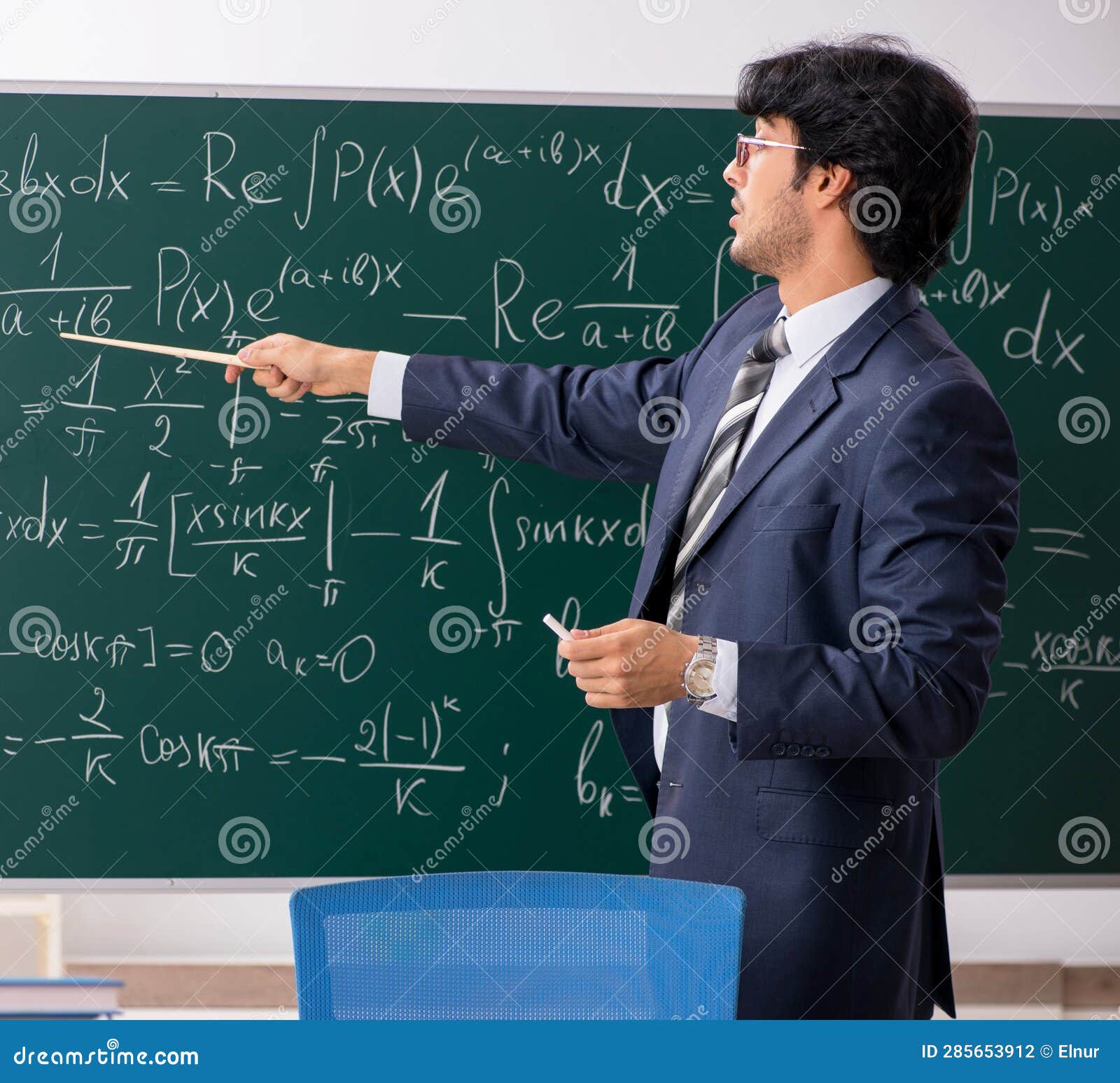 Young Male Math Teacher in Classroom Stock Photo - Image of ...