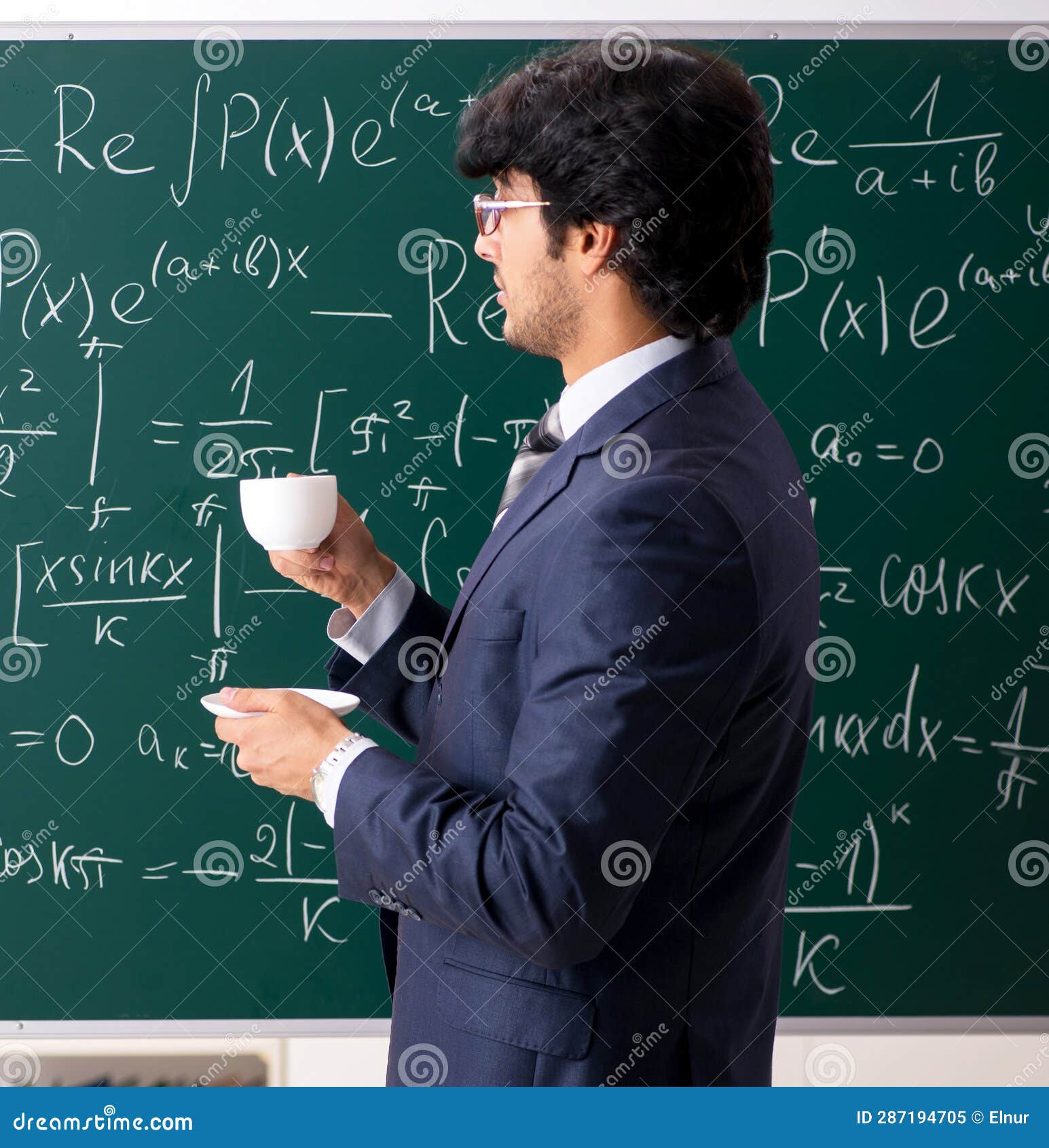 Young Male Math Teacher in Classroom Stock Image - Image of formula ...