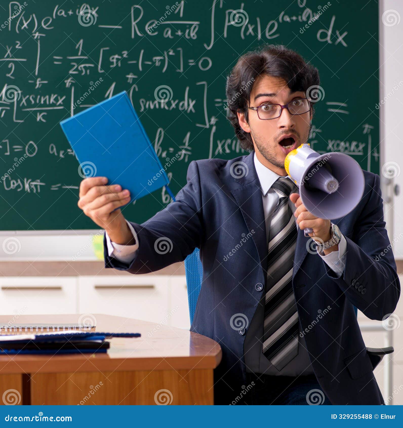 Young Male Math Teacher in Classroom Stock Photo - Image of formula ...