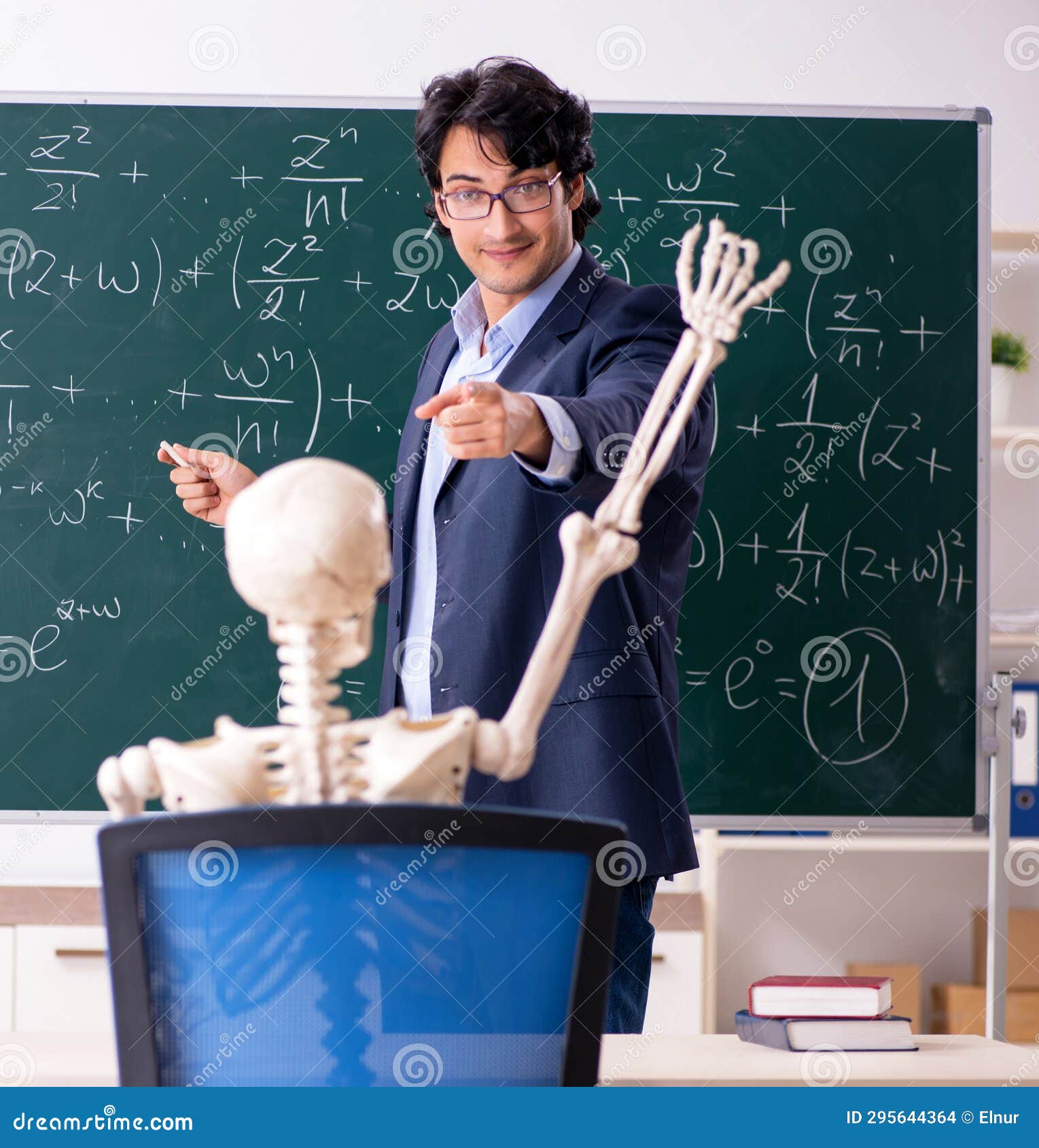 Young Male Math Teacher and Student Skeleton Stock Photo - Image of ...