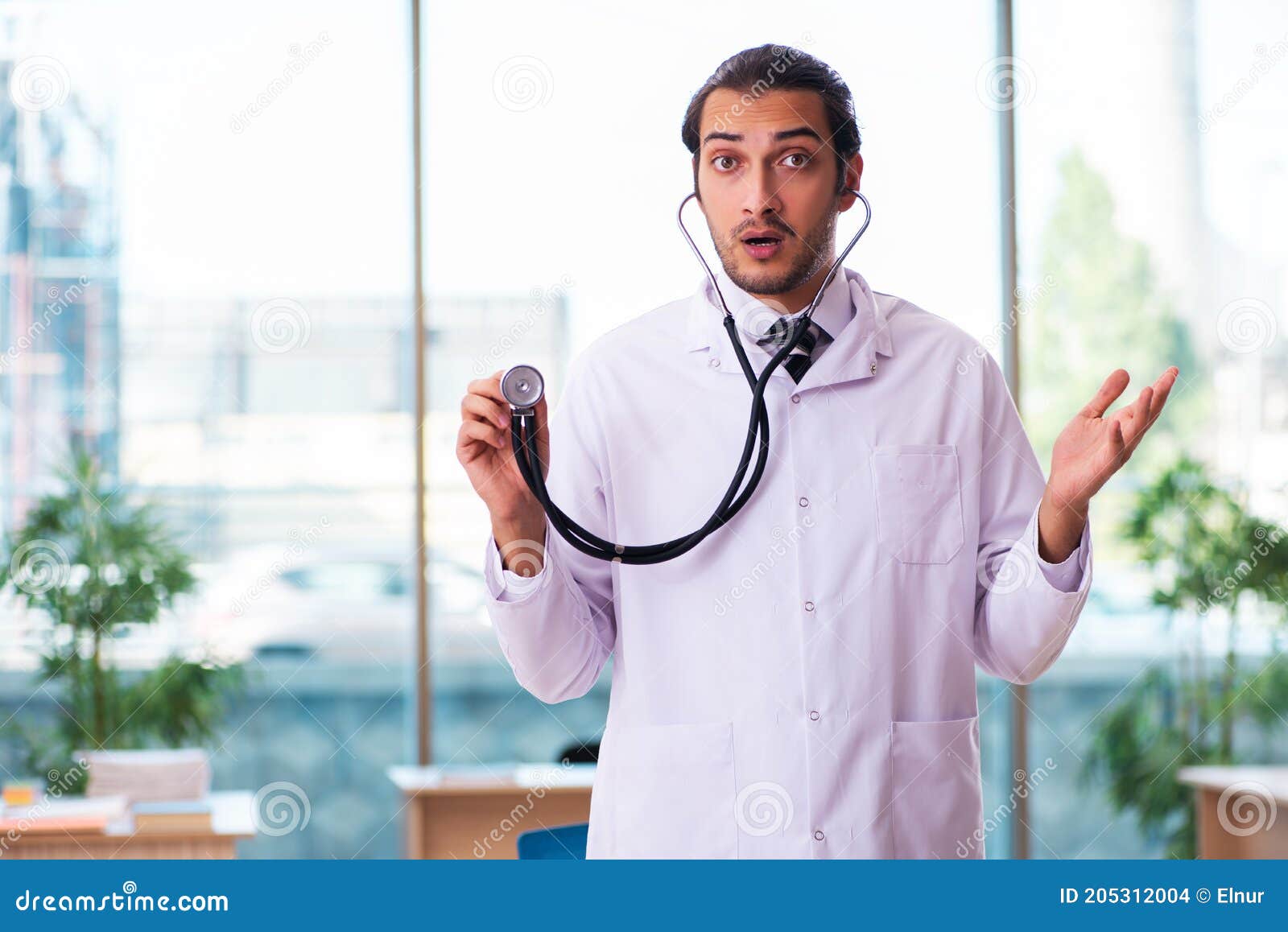 Young Male Medic Working in the Clinic Stock Photo - Image of care ...