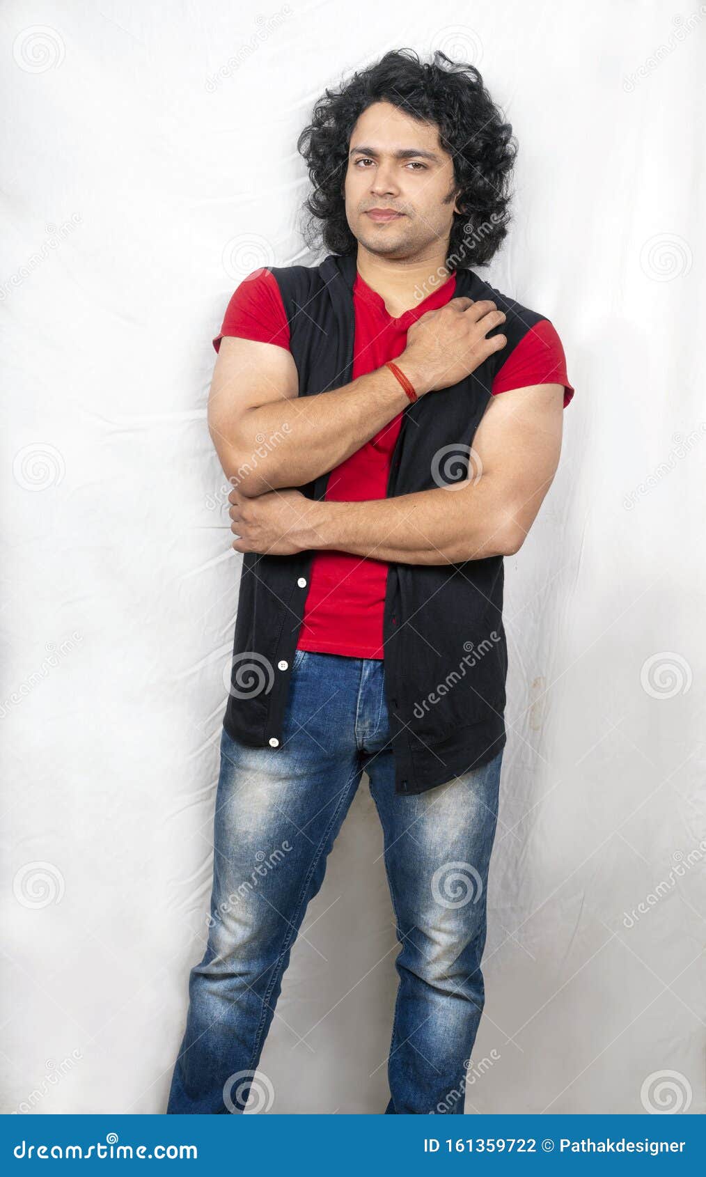 Young Male Model Wearing Red Tshirt Stock Photo - Image of jeans, hair ...