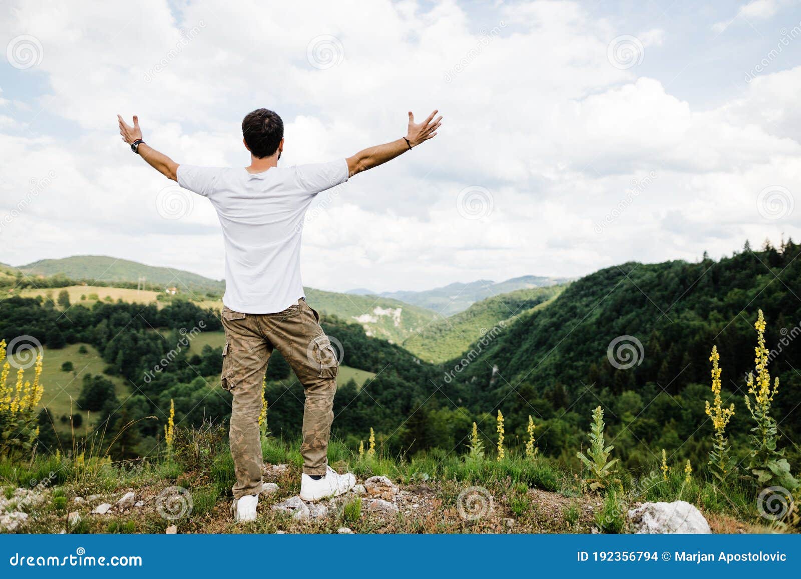Young Male Explorer on Top of Mountain Range Stock Photo - Image of ...