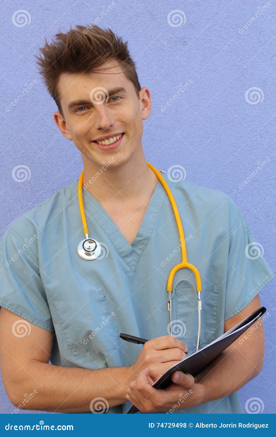 Young Male Nurse with a Clipboard Stock Photo - Image of expressing ...