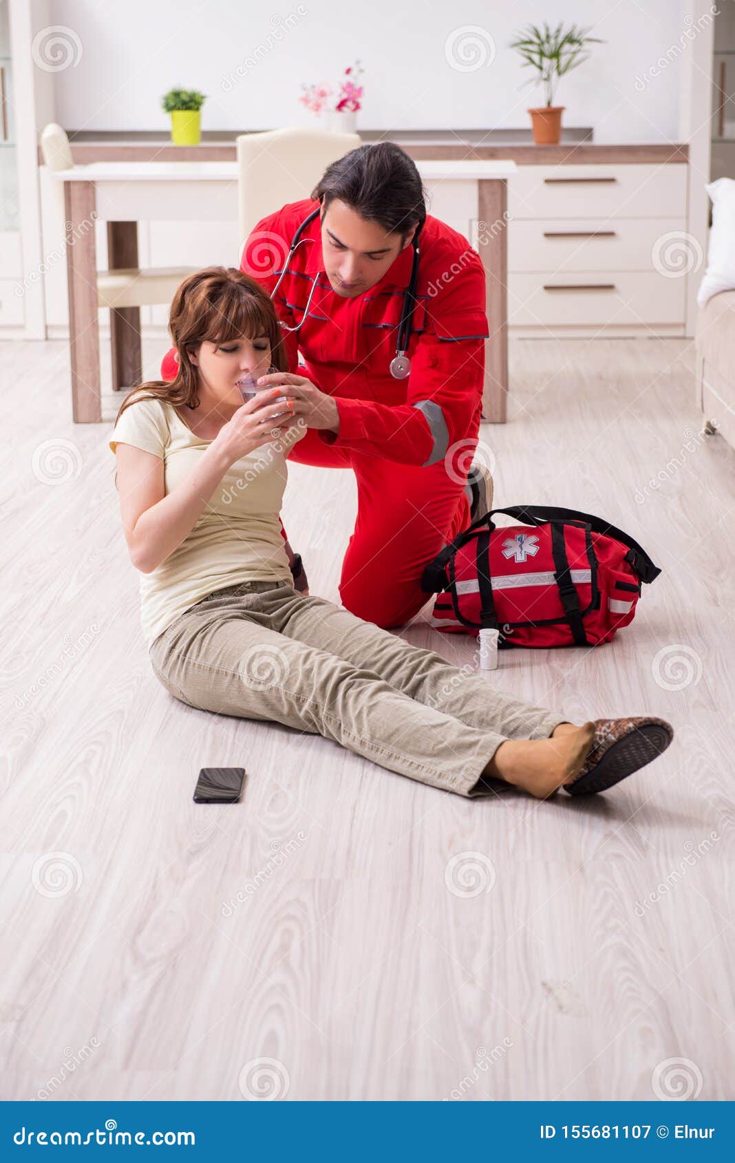 Young Male Paramedic Visiting Young Woman Stock Image - Image of help ...