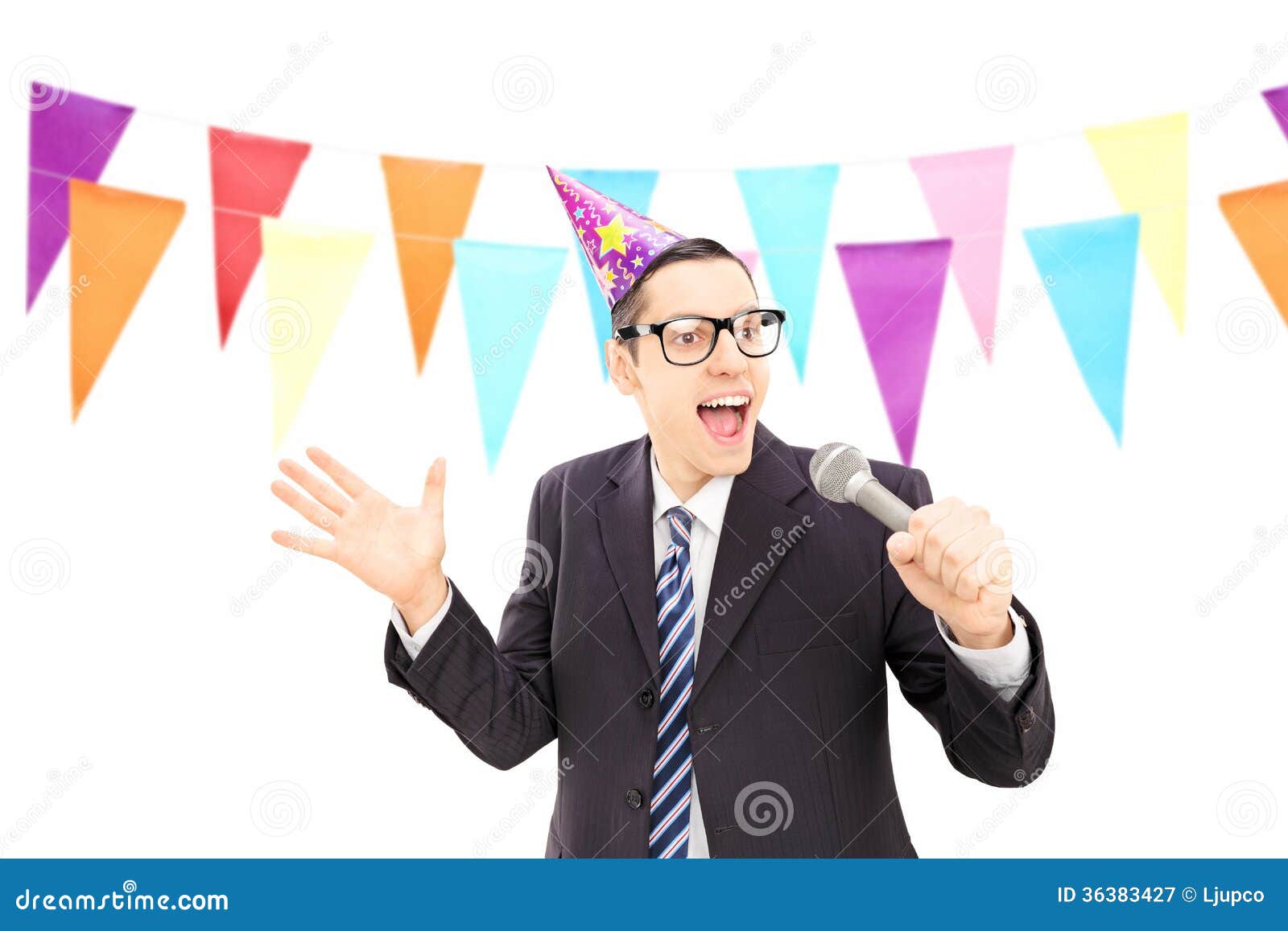 Young Male with Party Hat Singing during a Celebration Stock Image ...