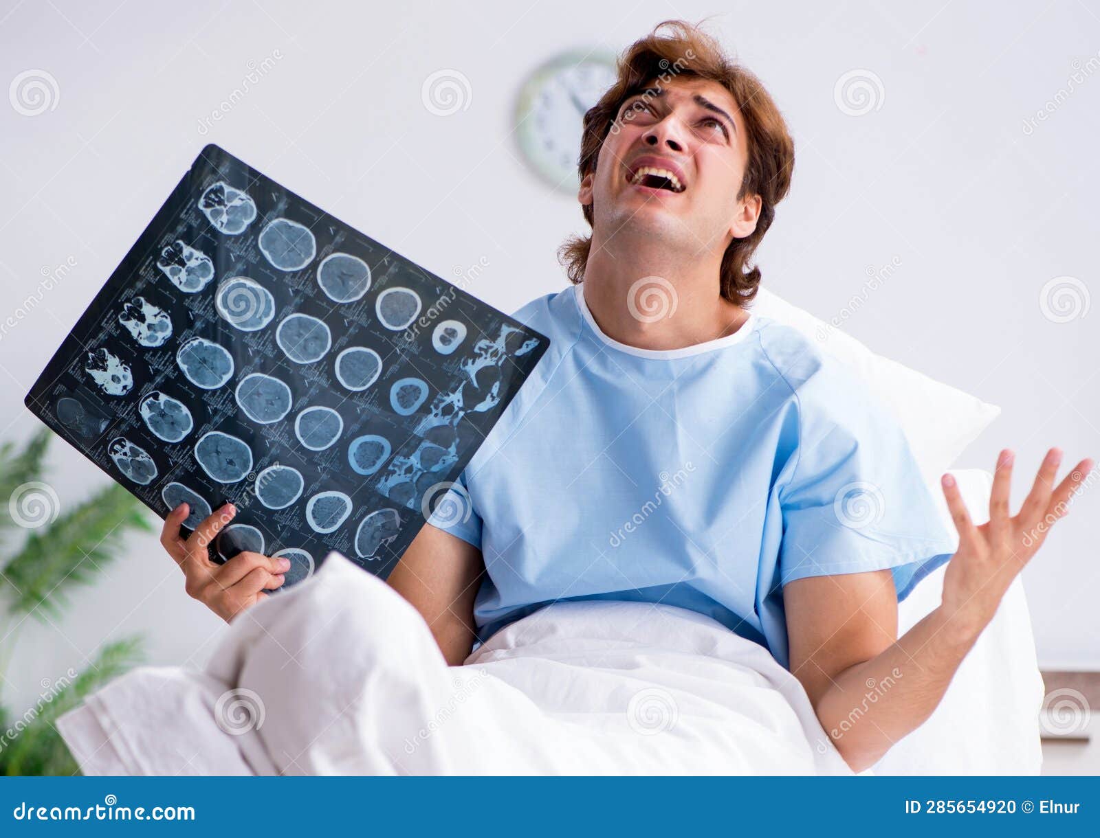 Young Male Patient Lying on Couch in Hospital Stock Photo - Image of ...