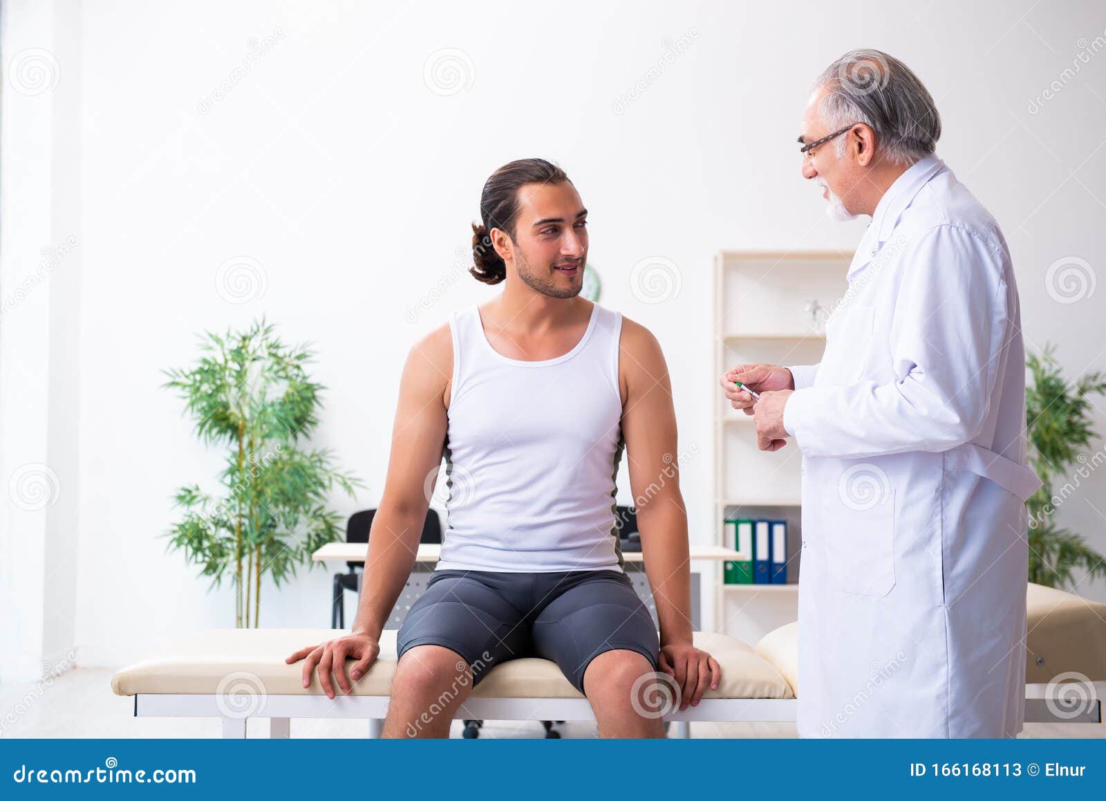 Young Male Patient Visiting Experienced Doctor Stock Image - Image of ...