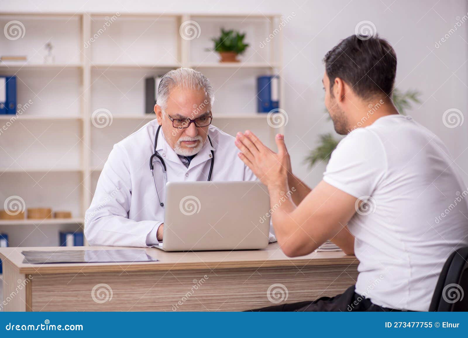 Young Male Patient Visiting Old Male Doctor Stock Image - Image of ...