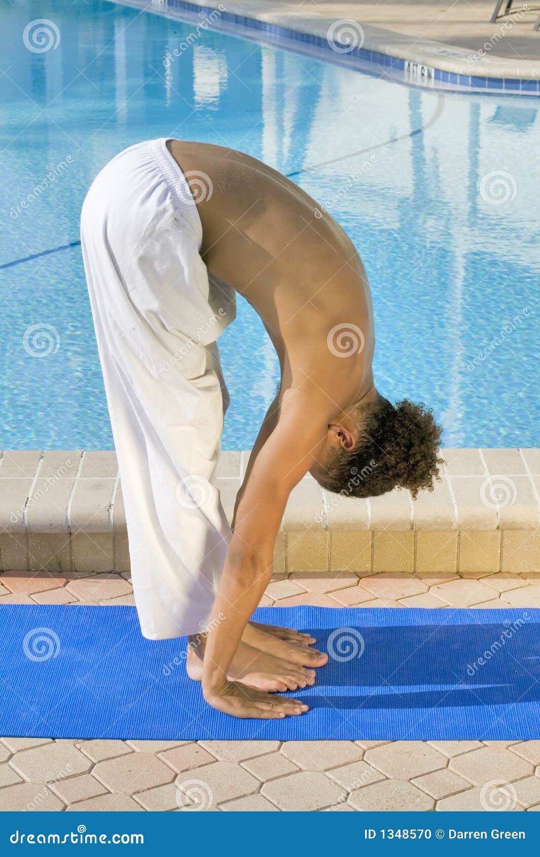 Young male practicing Yoga stock photo. Image of outdoors - 1348570