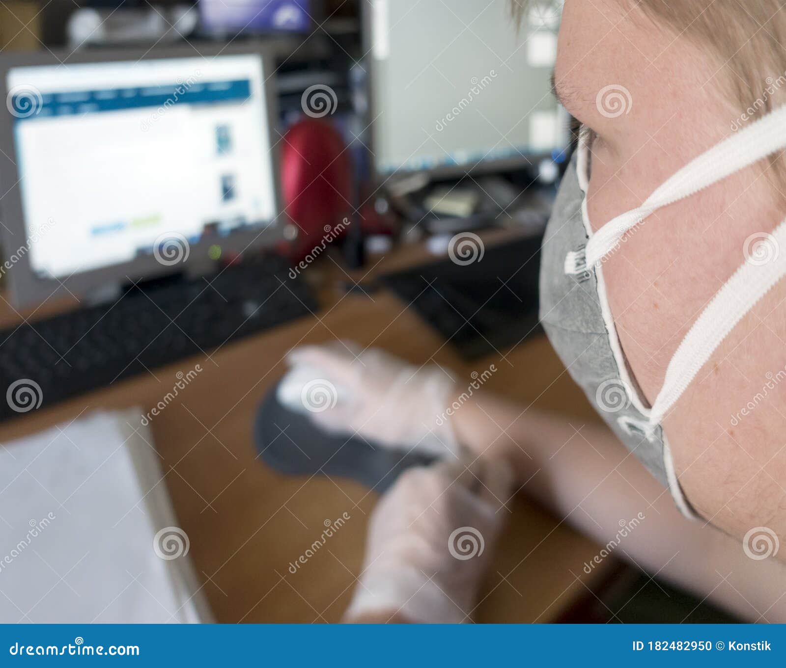 Young Male Programmer Working at a Computer in a Protective Mask and ...