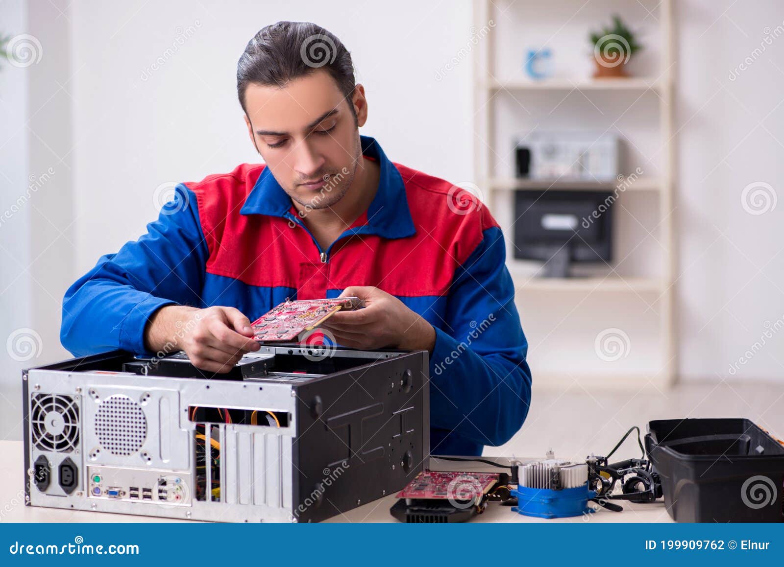 Young Male Repairman Repairing Computer Stock Photo - Image of parts ...