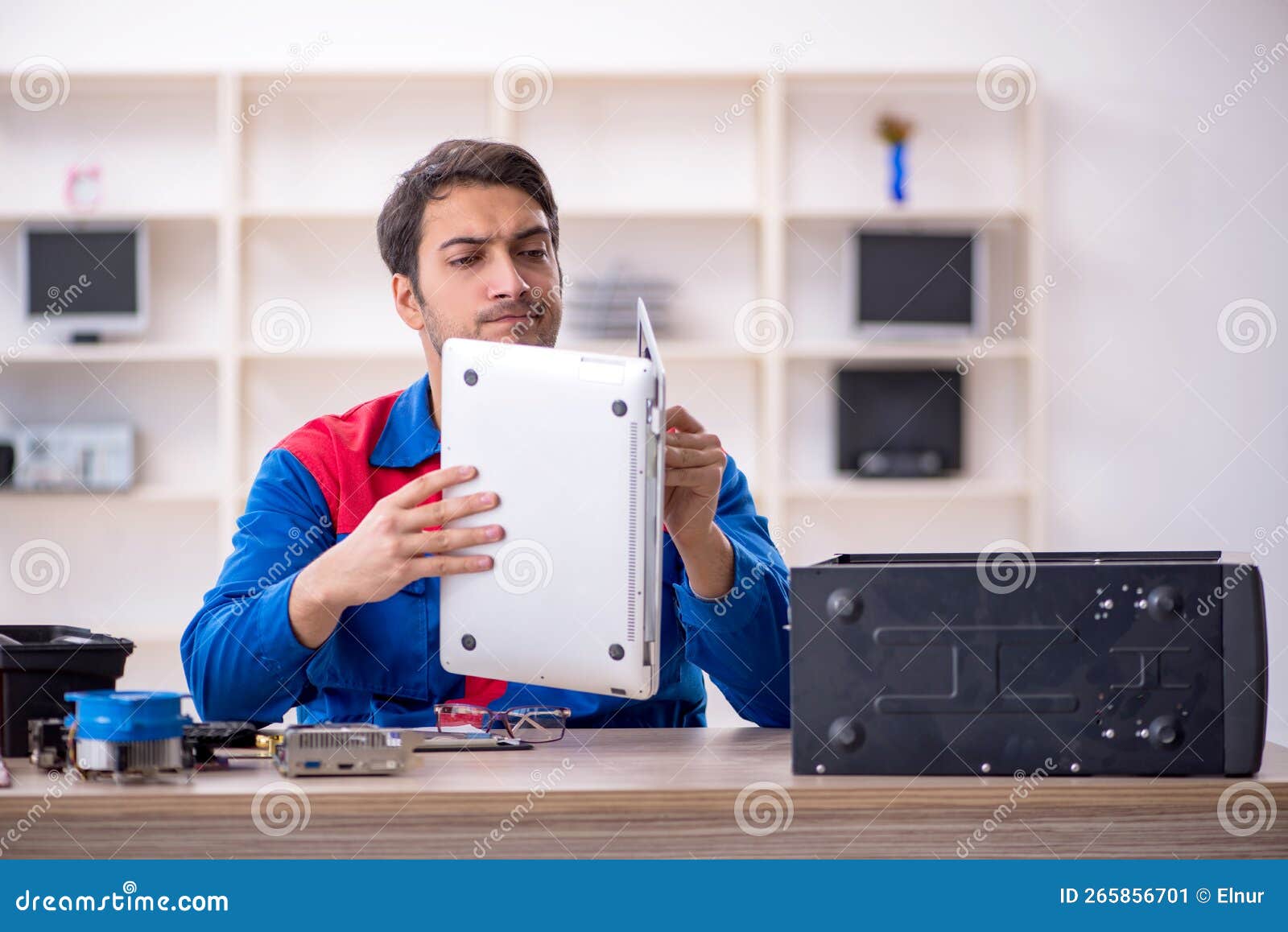 Young Male Repairman Repairing Computer Stock Image - Image of cleaning ...