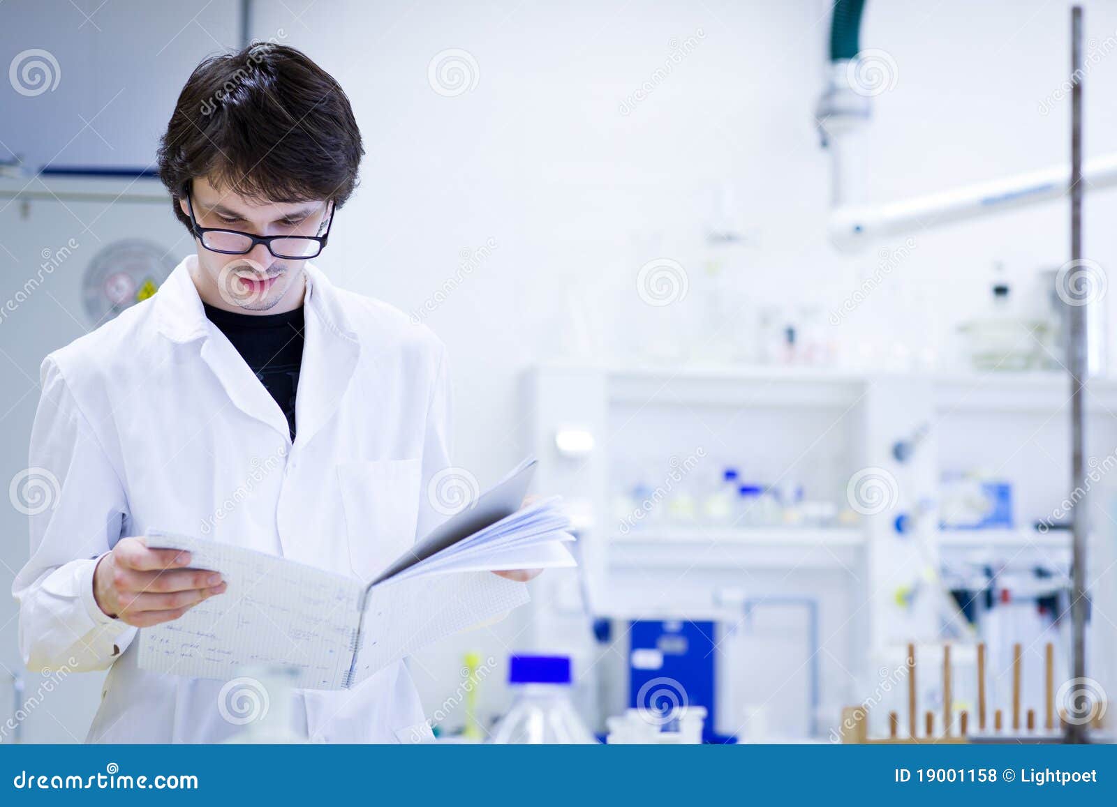 Young Male Researcher in a Chemistry Lab Stock Photo - Image of coat ...