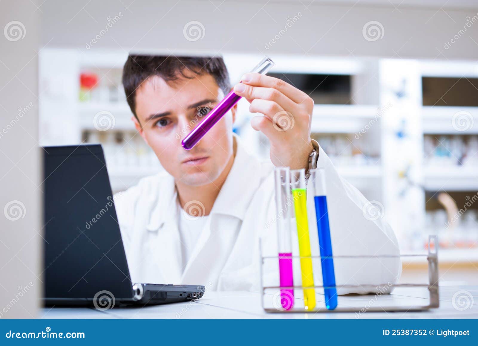 Young Male Researcher in a Lab Stock Photo - Image of liquid ...