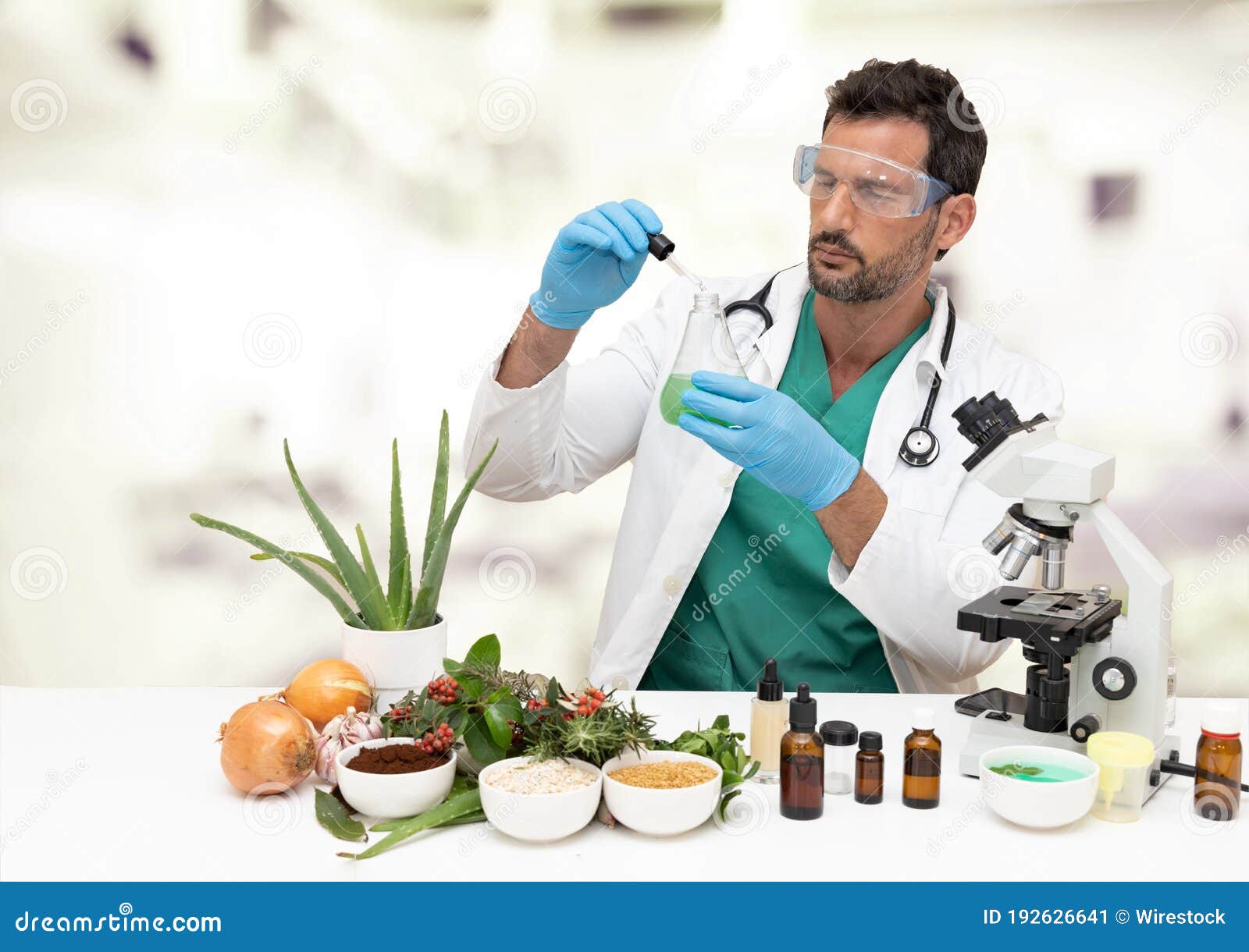 Young Male Scientist Doing Experimentation in the Laboratory Stock ...