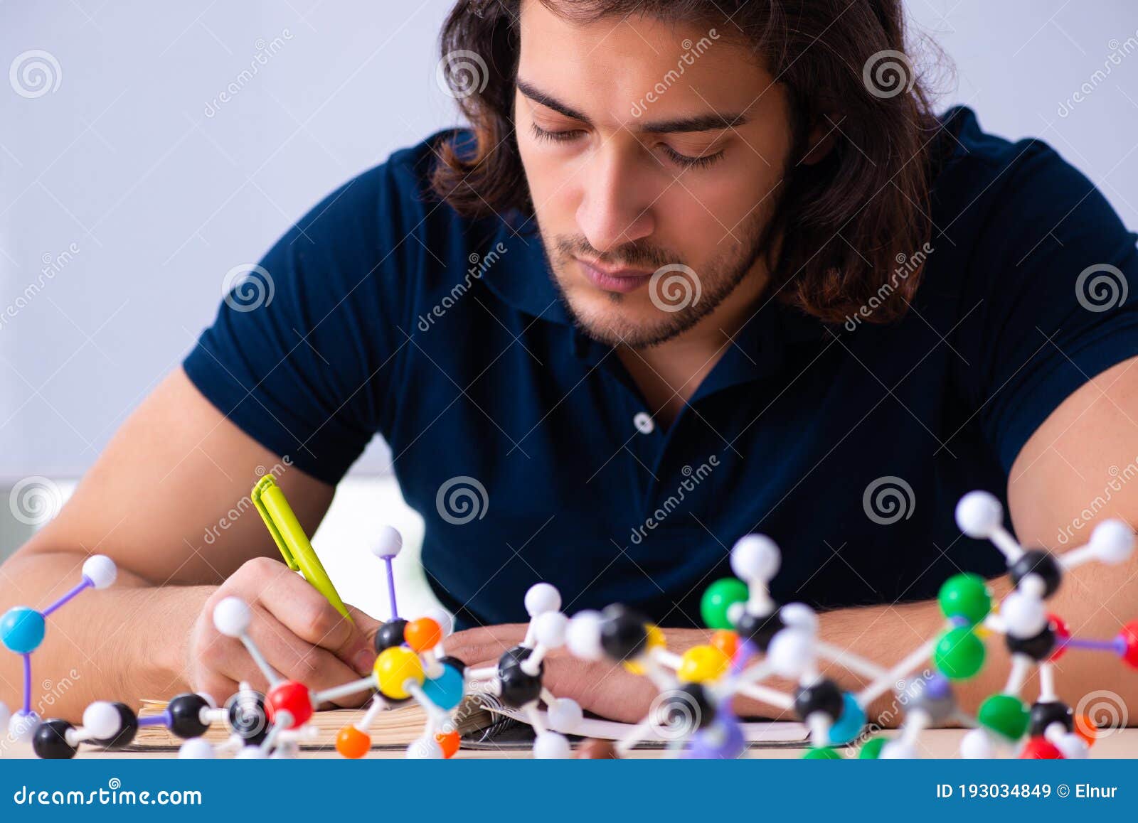Young Male Scientist Sitting in the Classroom Stock Image - Image of ...