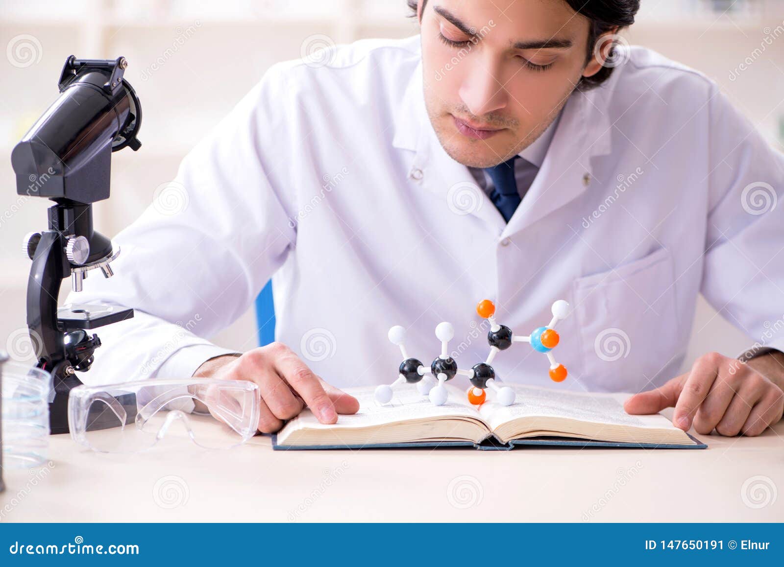The Young Male Scientist Working in the Lab Stock Image - Image of ...