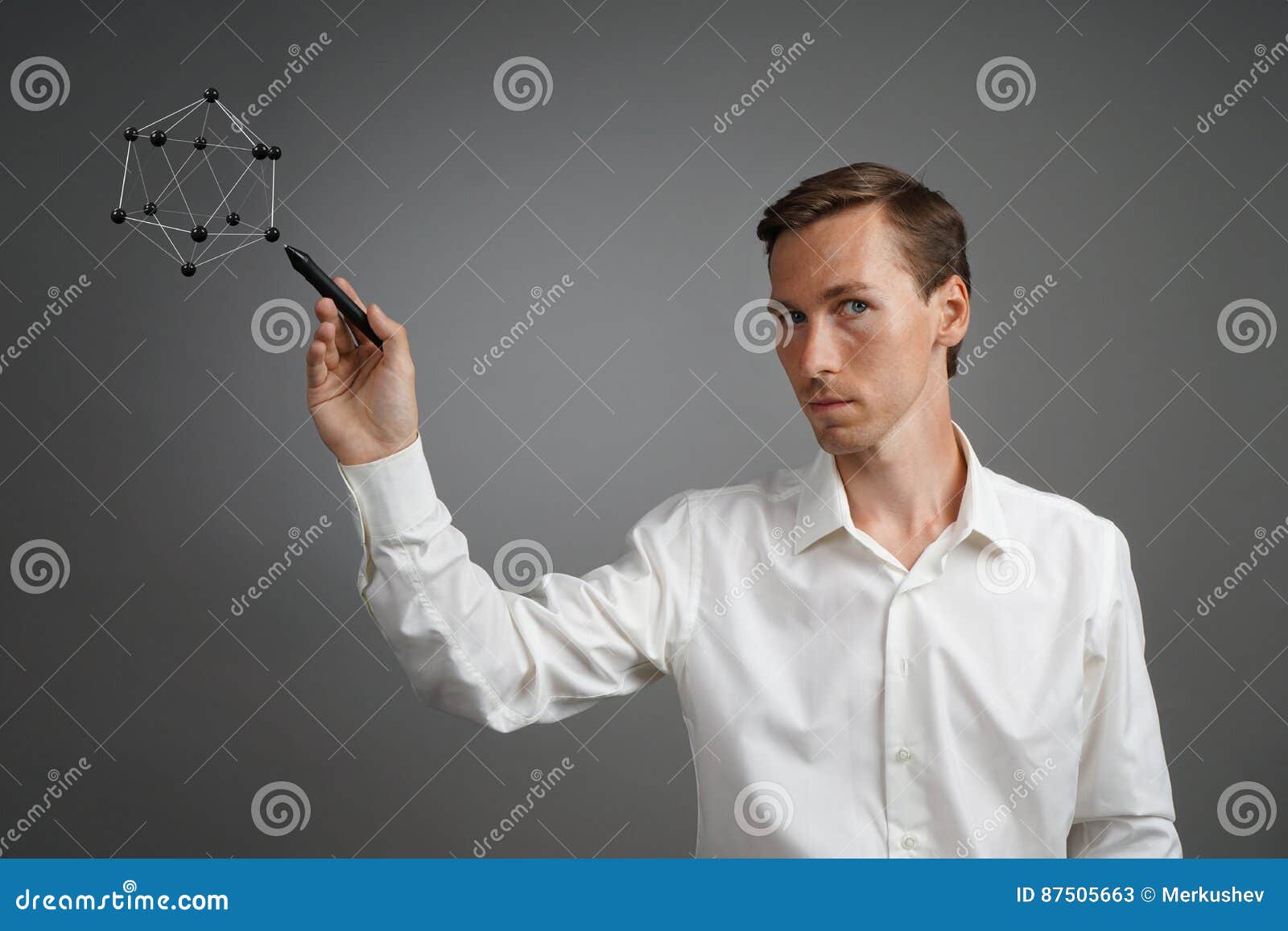 Young Male Scientist Working with a Model of the Atom. Stock Image ... Young Male Scientist Working with a Model of the Atom. Stock Image ...