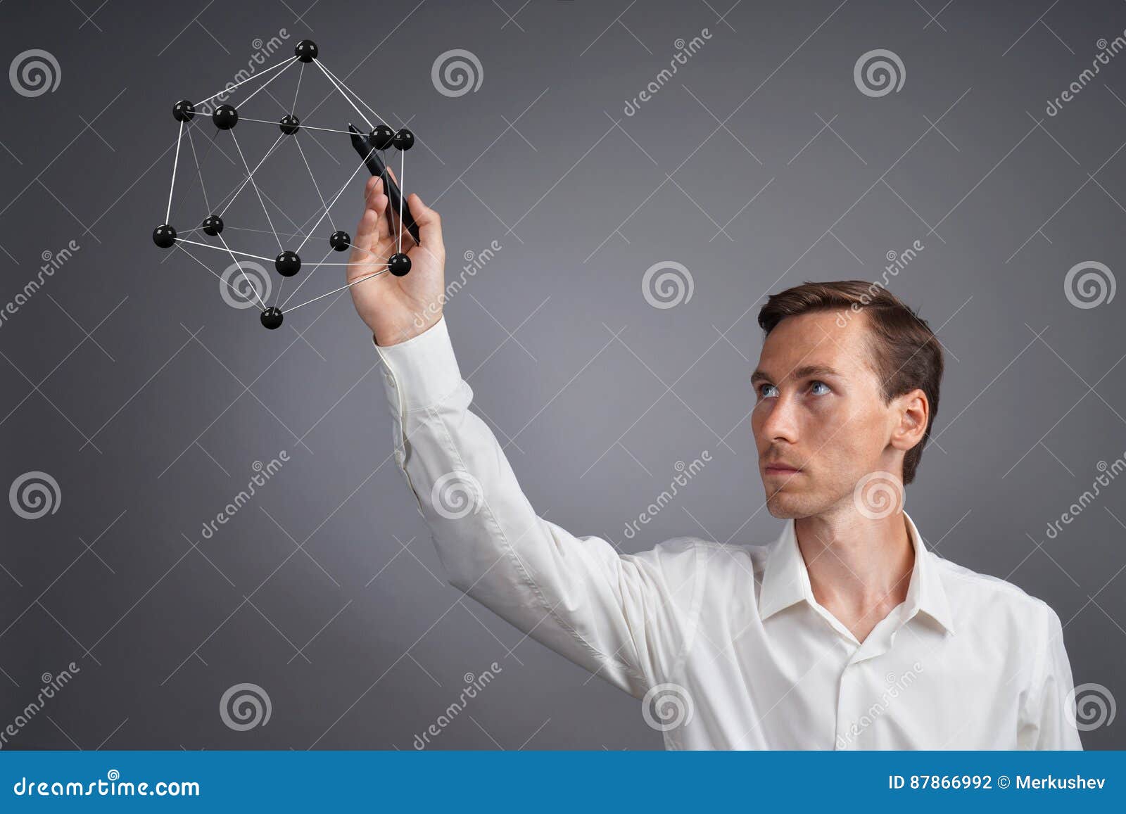 Young Male Scientist Working with a Model of the Atom. Stock Photo ... Young Male Scientist Working with a Model of the Atom. Stock Photo ...