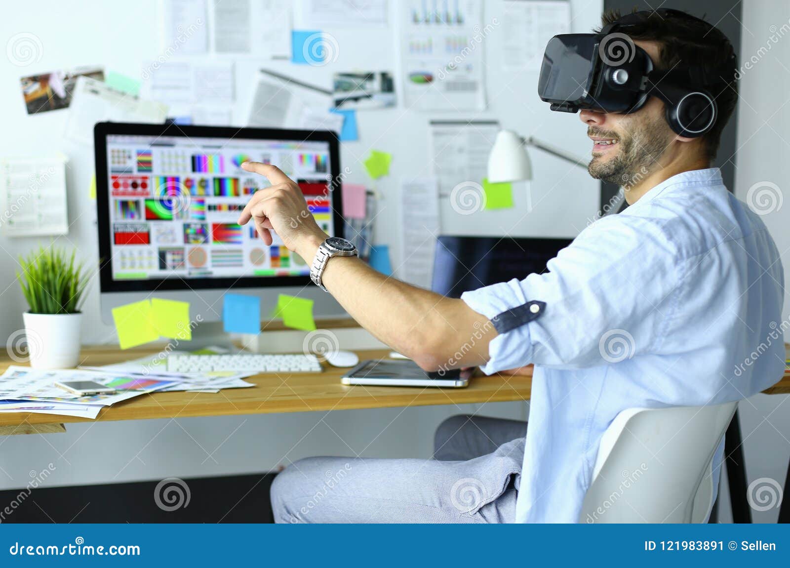 Young Male Software Programmer Testing a New App with 3d Virtual ...