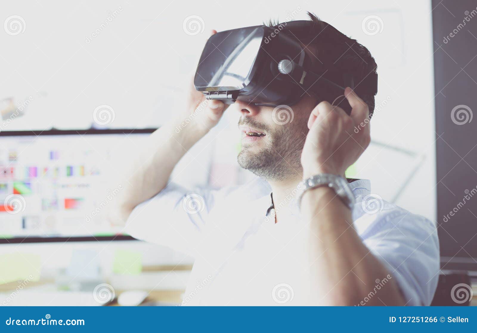 Young Male Software Programmer Testing a New App with 3d Virtual ...