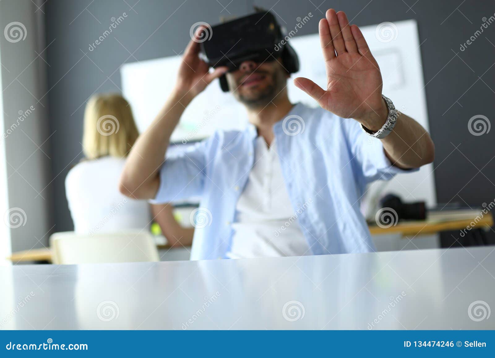 Young Male Software Programmer Testing a New App with 3d Virtual ...