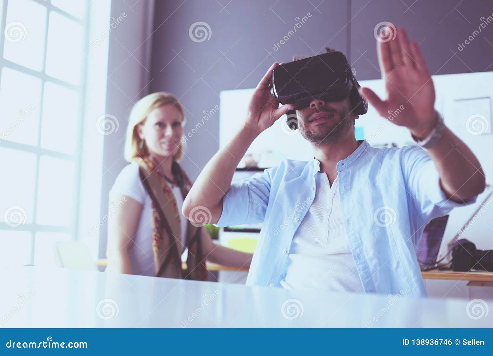 Young Male Software Programmer Testing a New App with 3d Virtual ...