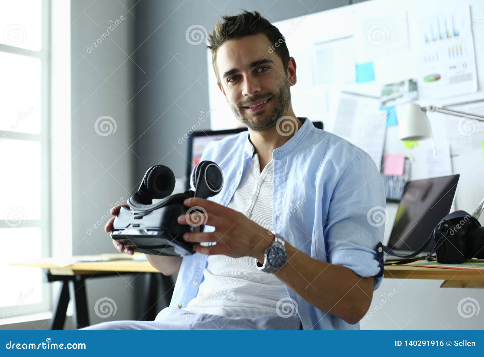 Young Male Software Programmer Testing a New App with 3d Virtual ...